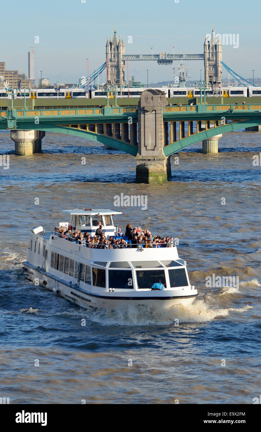 London, England, UK. Riverboat M.V. Sapele passing under London Bridge ...