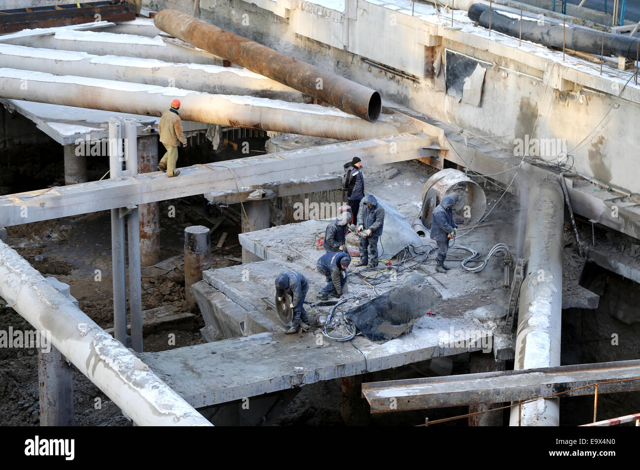 workers working at a construction site at the construction site of a ...
