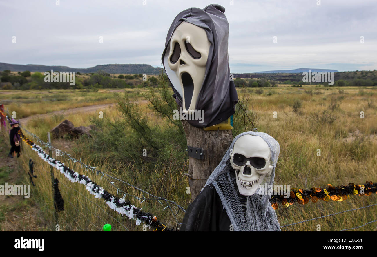 Masks used as Halloween decoration at ranch entrance in West Texas ...