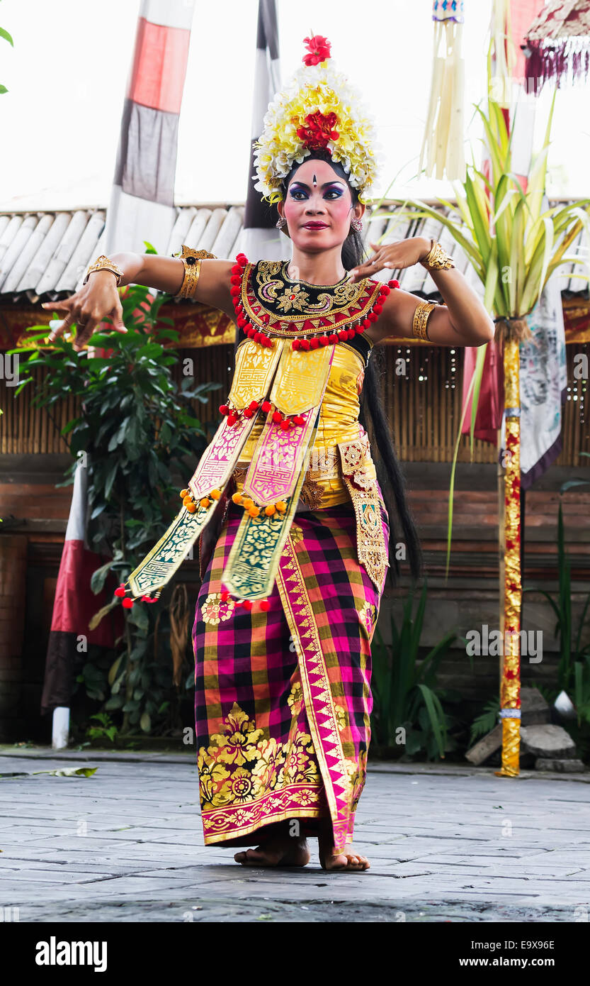 Balinese dancer using codified hand positions and gestures at a Barong ...