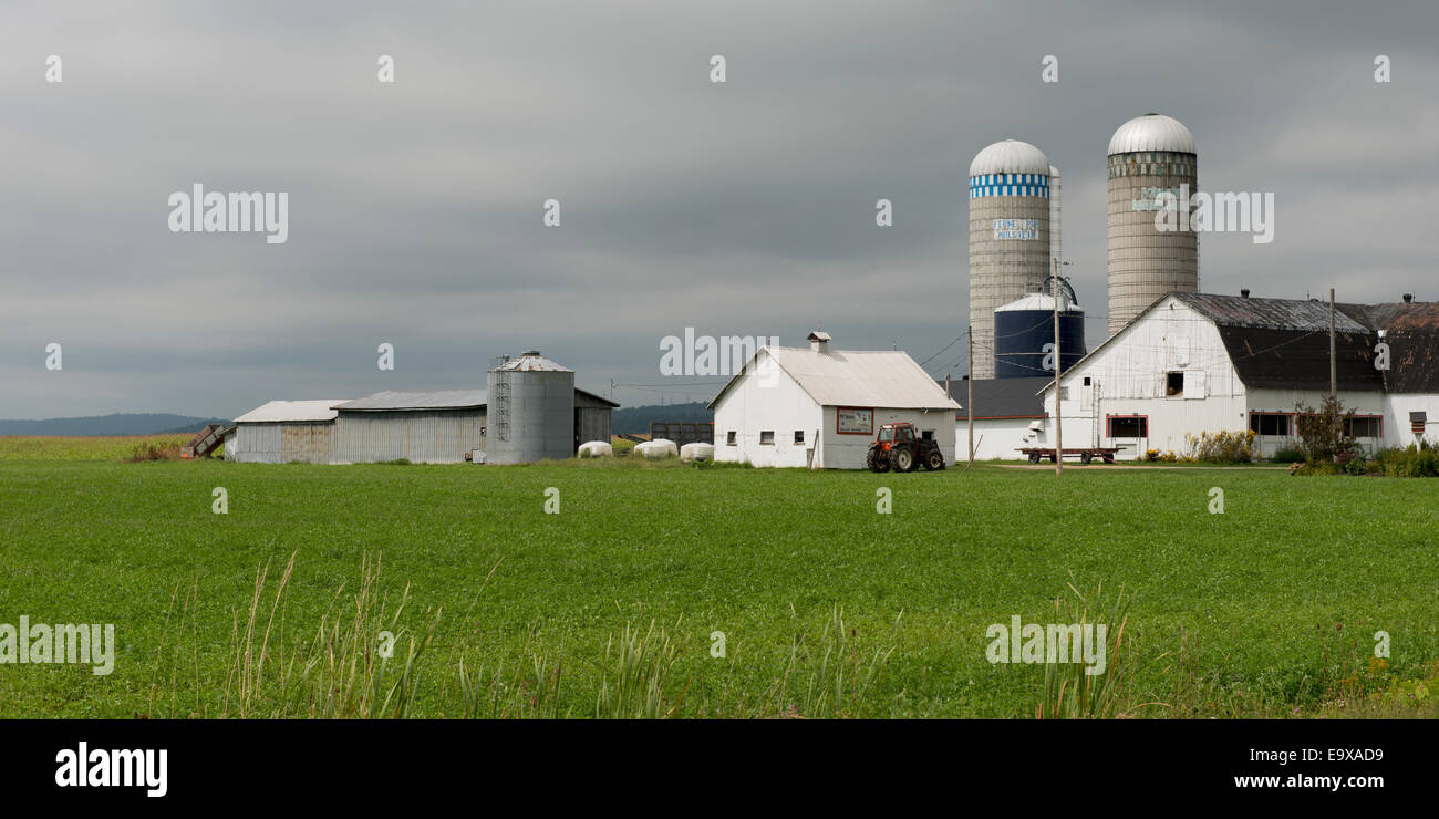 A farm under a cloudy sky; Plaisance, Quebec, Canada Stock Photo - Alamy