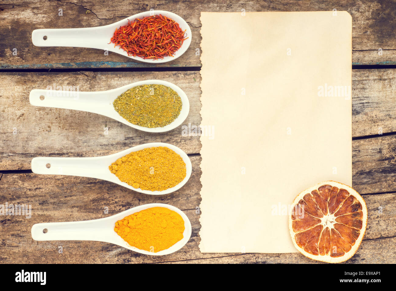 Vintage Spices recipe background. Various condiments with dried orange ...