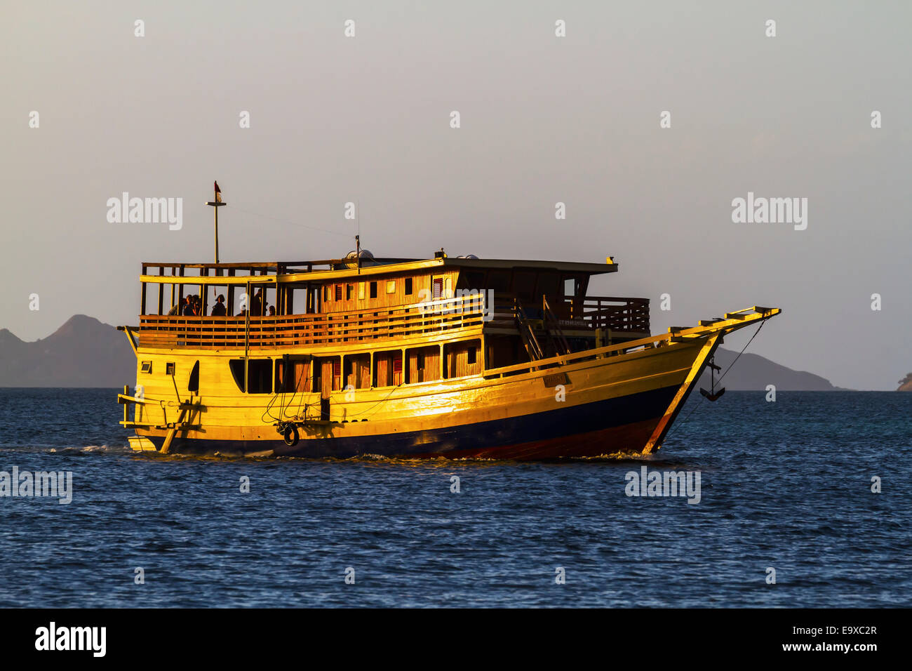 Passenger boat in Kima Bay by Rinca Island, Komodo National Park, East ...