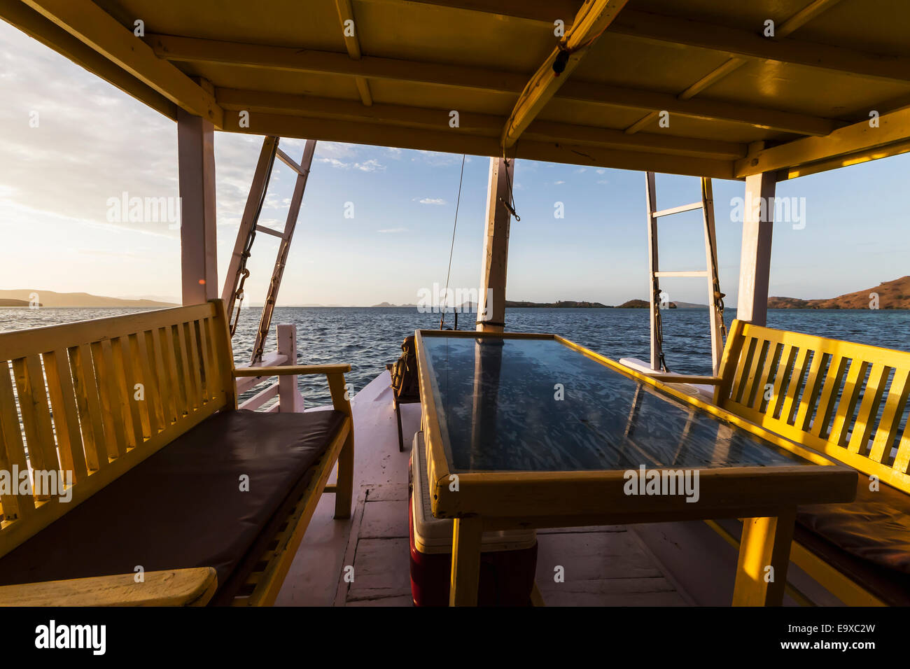 Sunset, as seen from a boat in Kima Bay by Rinca Island, Komodo ...
