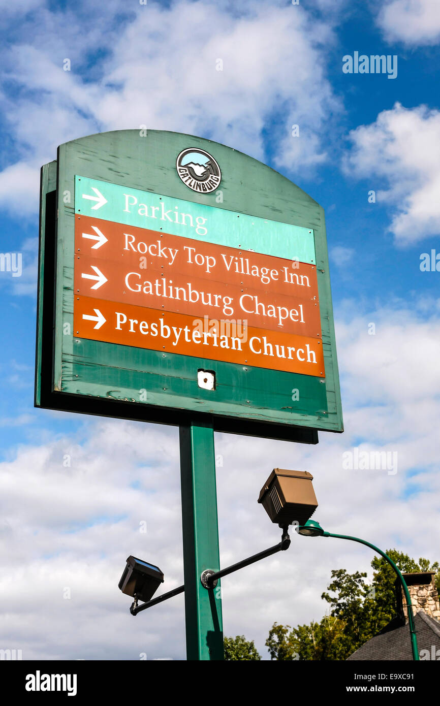 Tourist information sign giving directions an Inn and two churches in ...