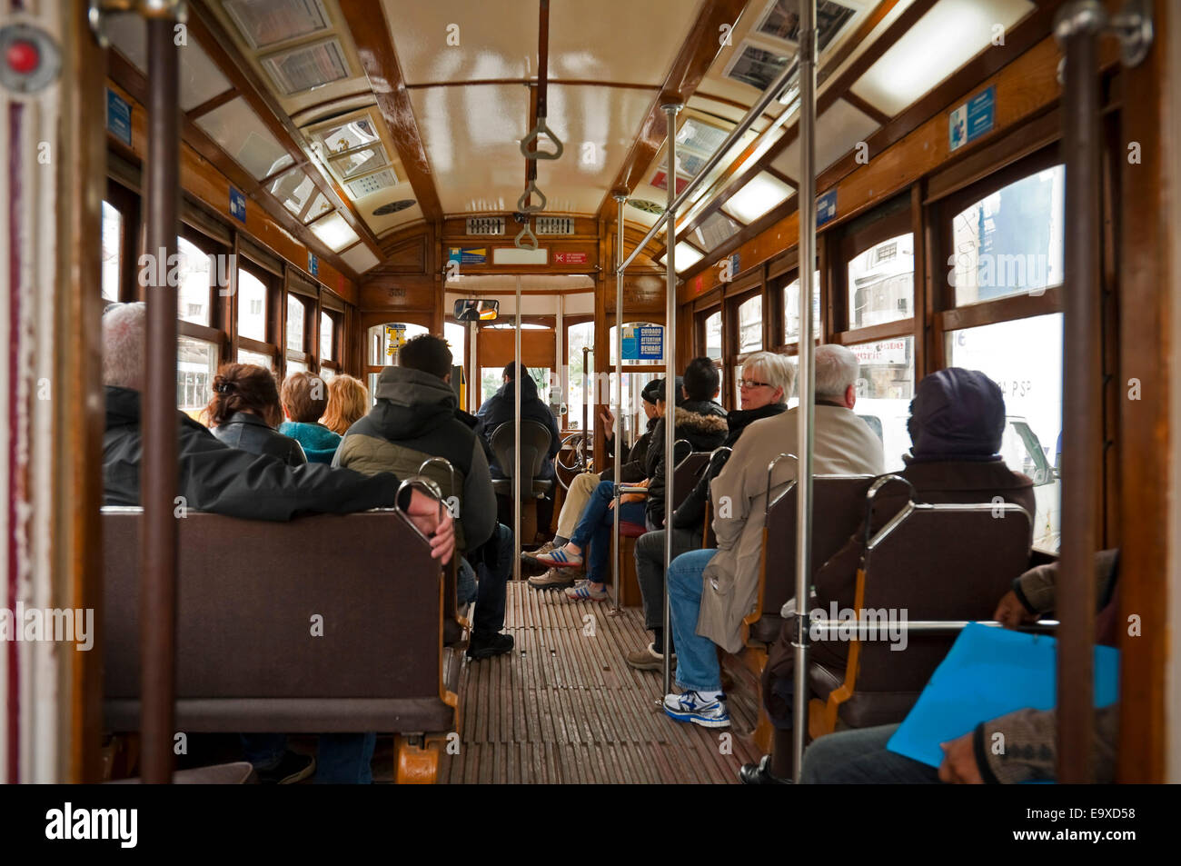 Horizontal view of the inside of the traditional old yellow tram in ...