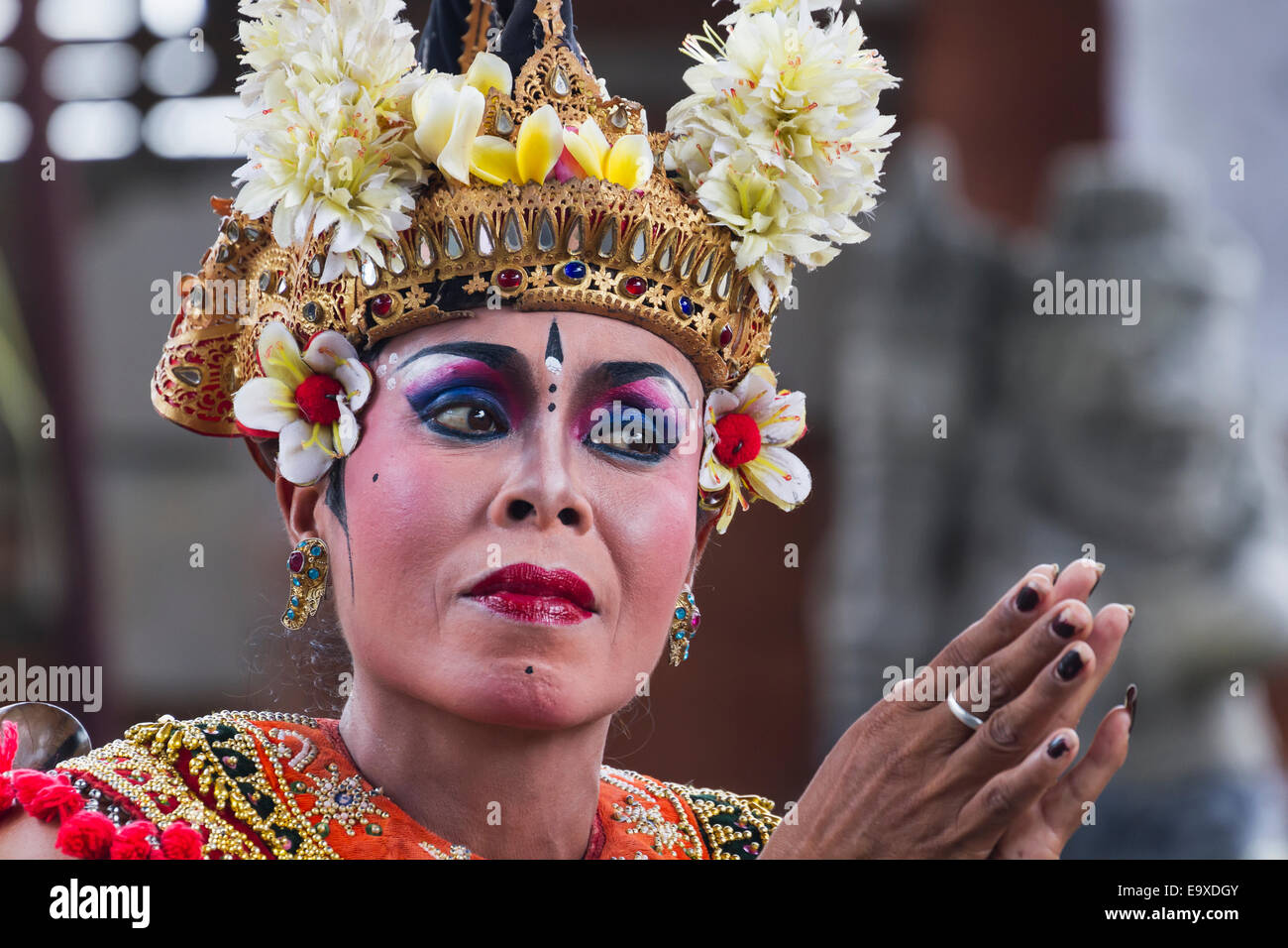 Balinese dancer using codified hand positions and gestures at a Barong ...