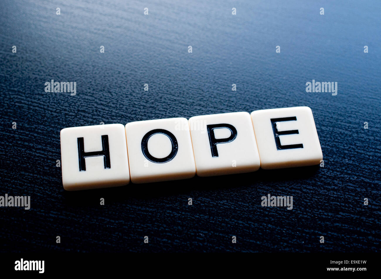 Alphabet Blocks spelling the words hope Stock Photo - Alamy
