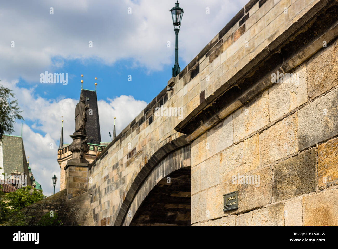 Architecture details, tower and sculpture of Charles Bridge in Prague ...