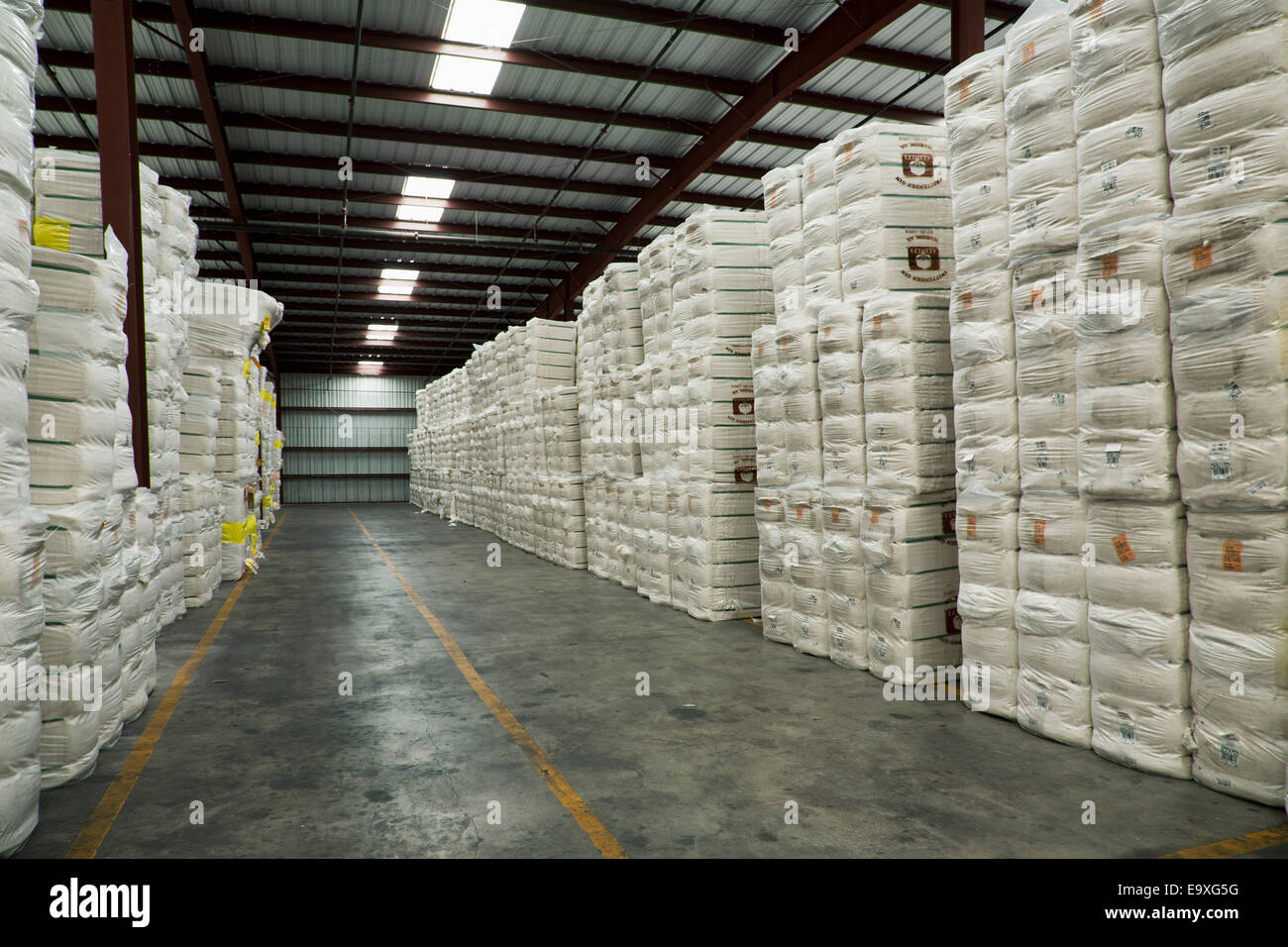 Agriculture - Cotton bales stacked and stored in a warehouse / Eastern ...