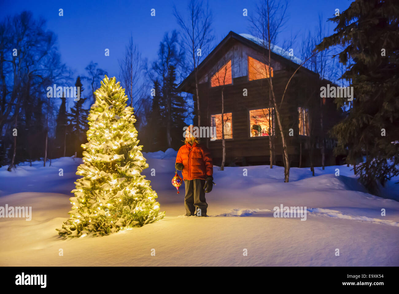 Lighted tree in window hi-res stock photography and images - Alamy