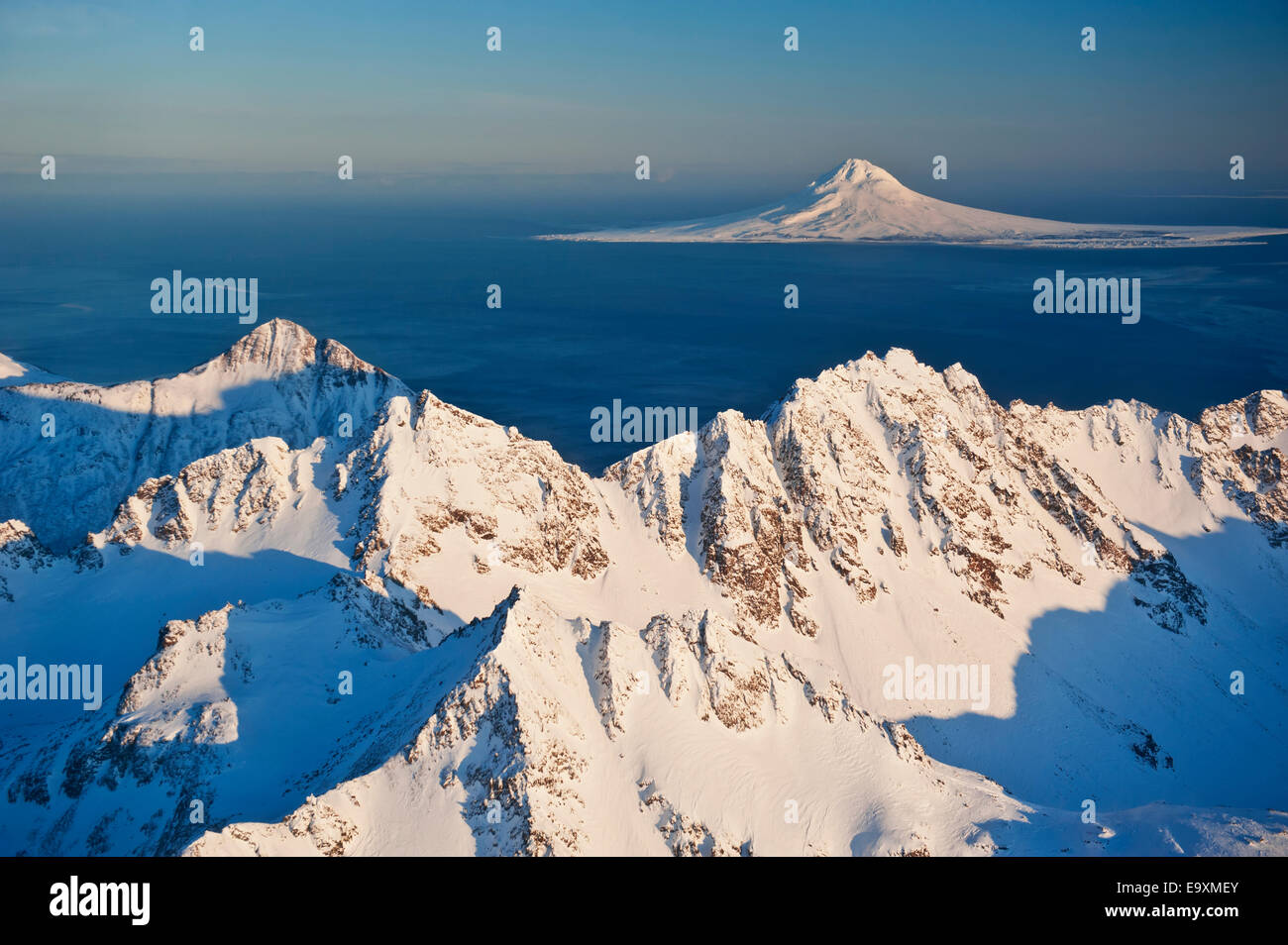 Aerial view of a ridge in the Alaska range with Cook Inlet and Mt ...