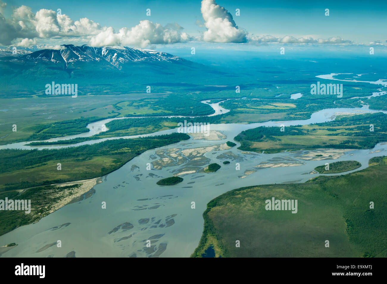 Aerial view of the Susitna River and Mt. Susitna in early summer ...