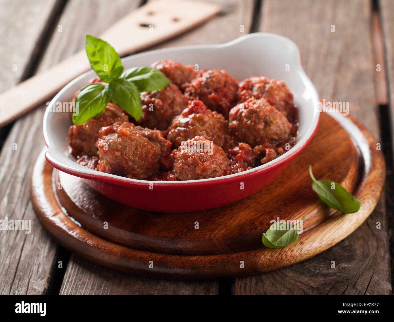 Minced meat ball in tomato sauce, selective focus Stock Photo - Alamy