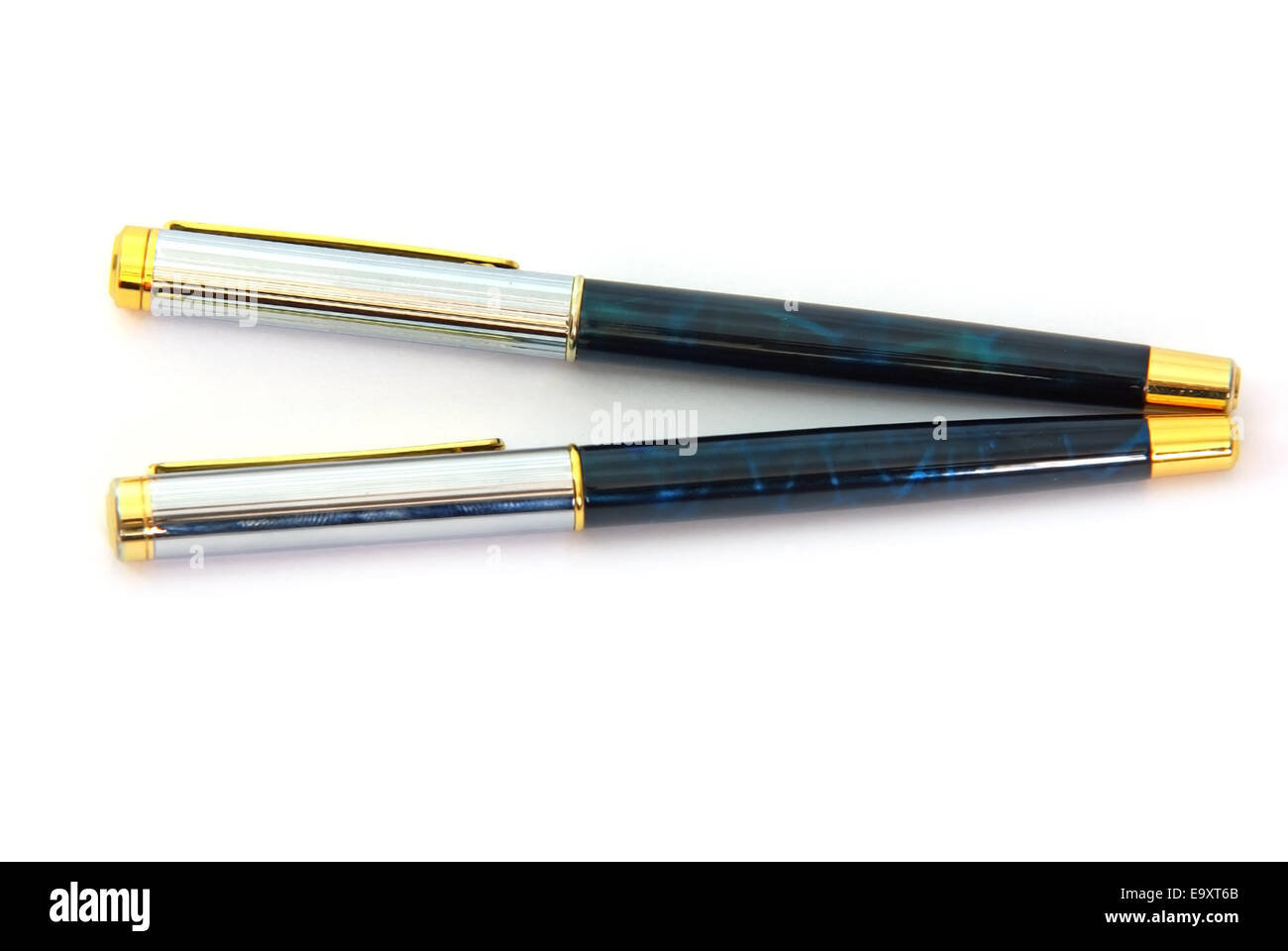 Close up image of two pens isolated on white Stock Photo - Alamy