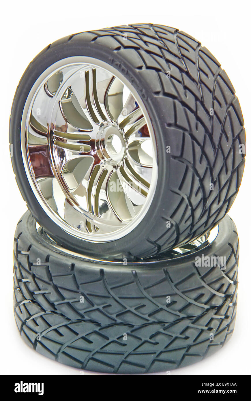 Two street tyres over a white background Stock Photo - Alamy