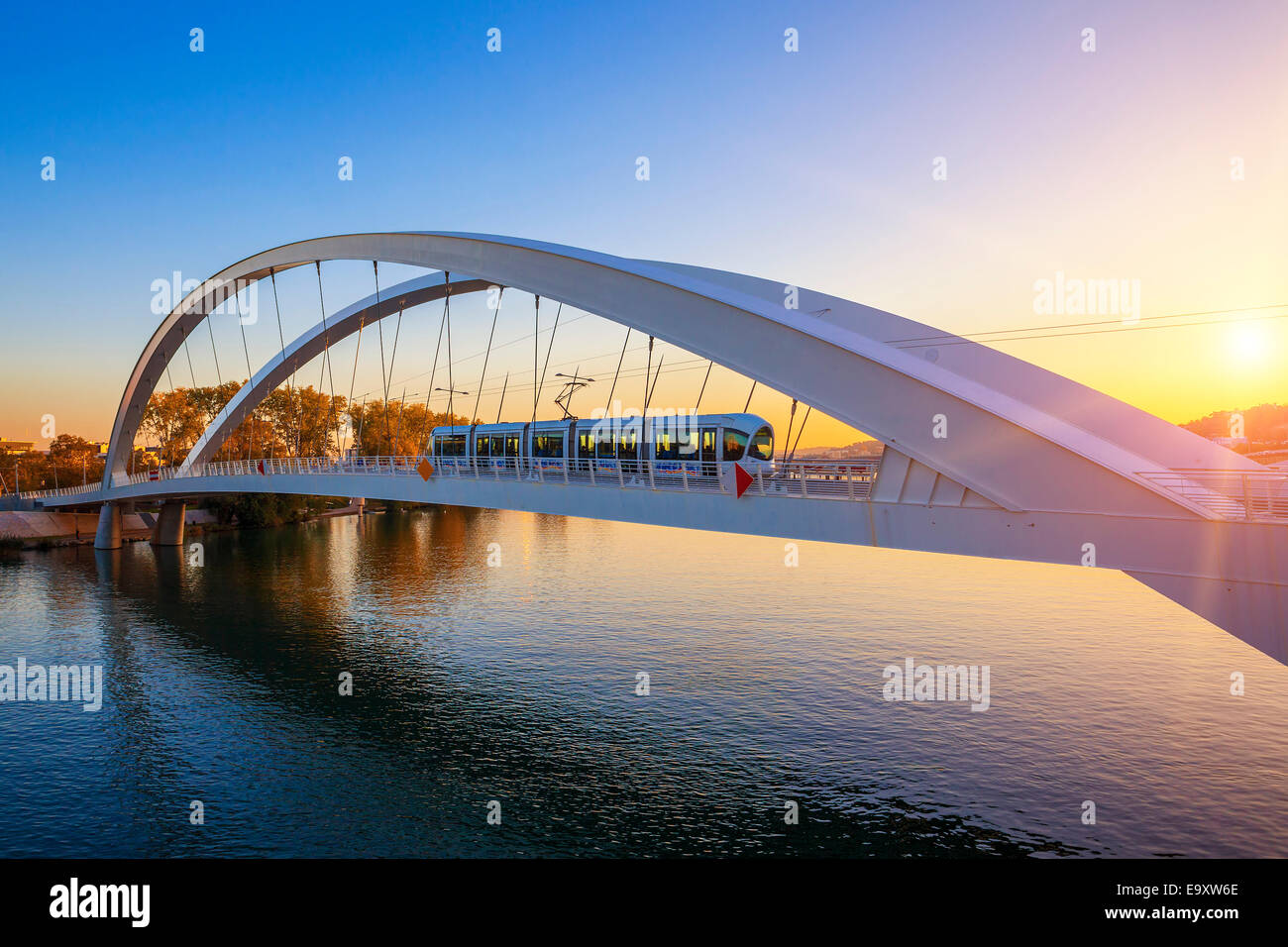 Tramway on the bridge at sunset, Lyon, France Stock Photo - Alamy