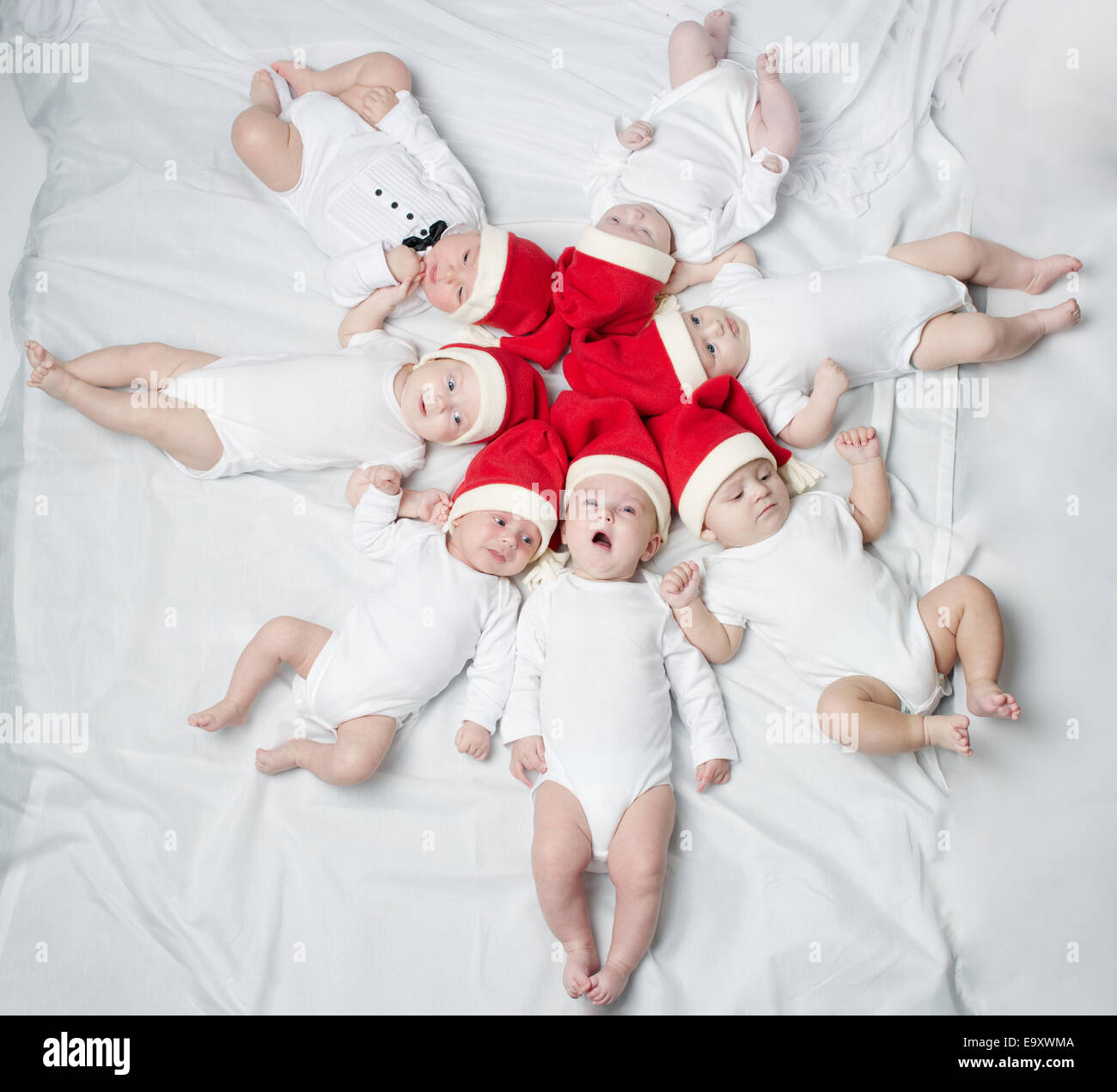 cute babies with santa hats Stock Photo - Alamy