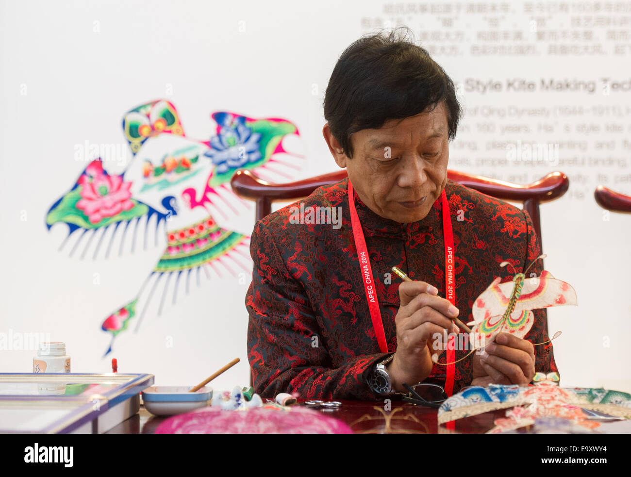 Beijing, China. 4th Nov, 2014. Ha Yiqi, the inheritor of a traditional ...