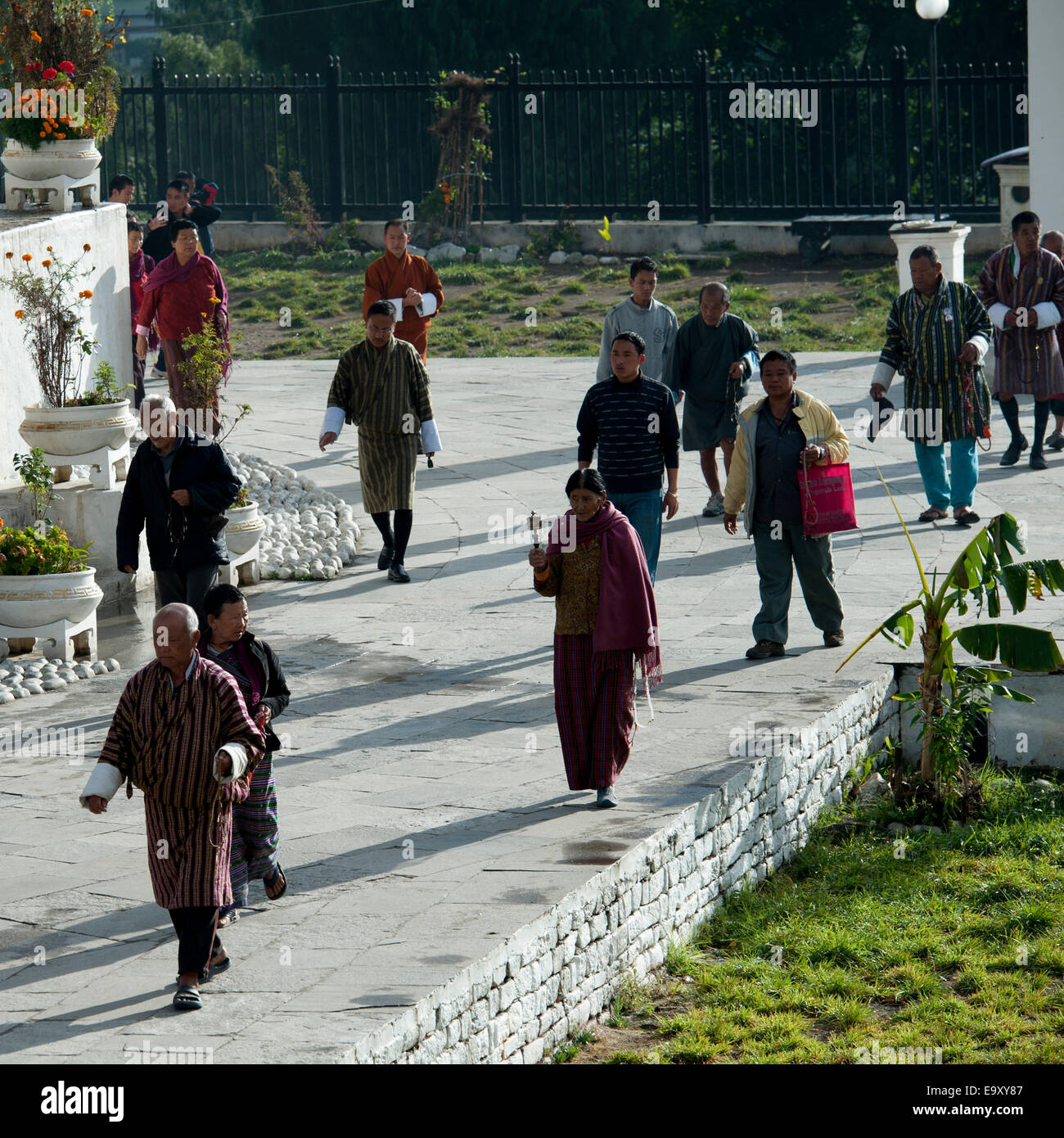 Bhutanese people walking along a pathway in Thimphu, Bhutan Stock Photo ...