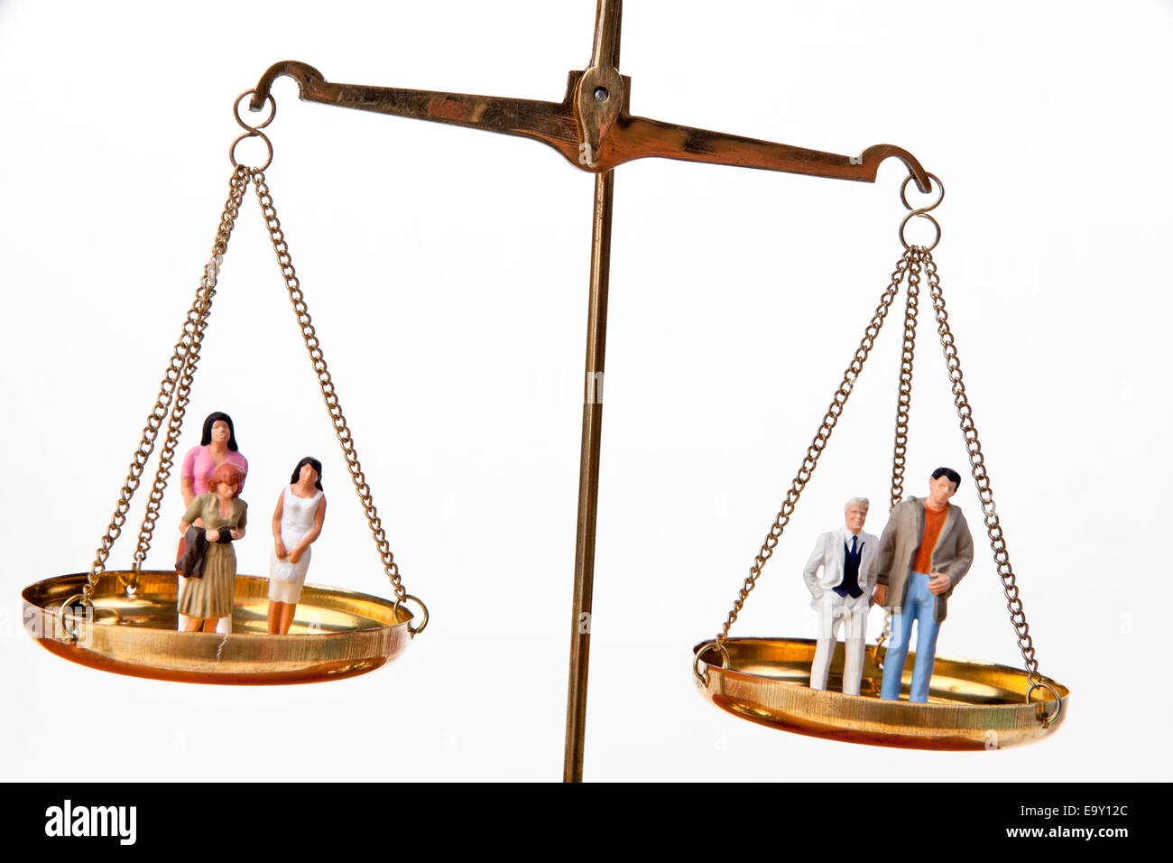 Man and woman on scale, symbol for equality Stock Photo - Alamy