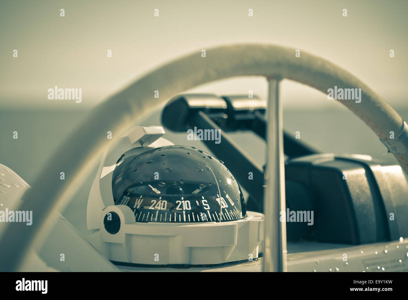 Sailing yacht control wheel and implement. Horizontal shot without ... Sailing yacht control wheel and implement. Horizontal shot without ...