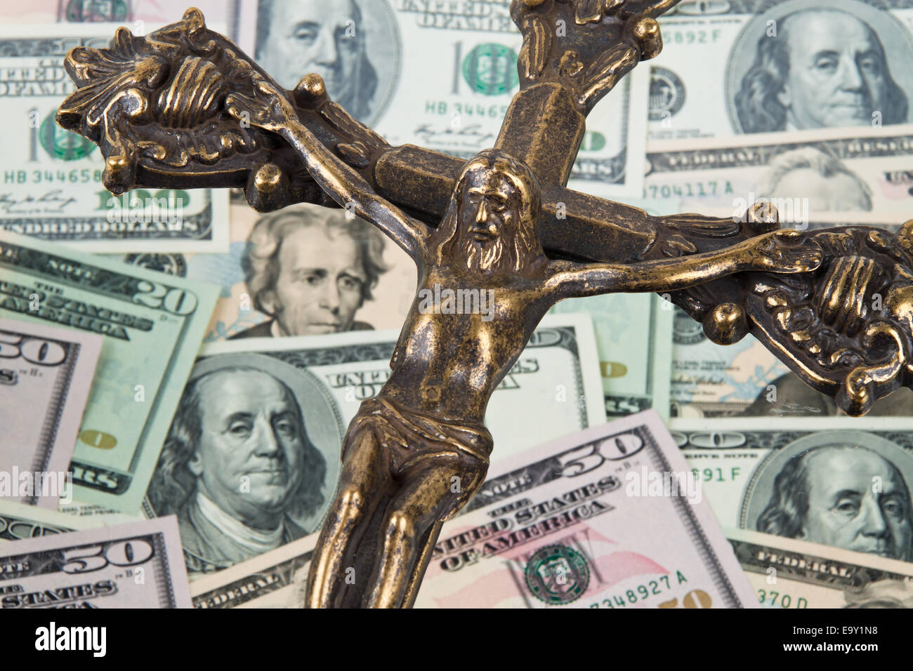 Many dollar bills and cross. Financing of Religion in America Stock ...