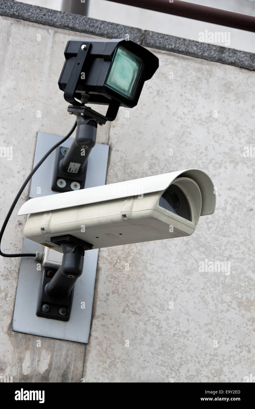 A video surveillance camera to protect a building Stock Photo - Alamy