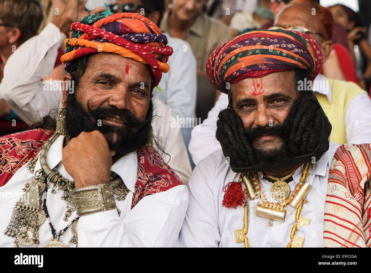 Rajasthan, India. 4th Nov, 2014. Participants show their moustache at a ...