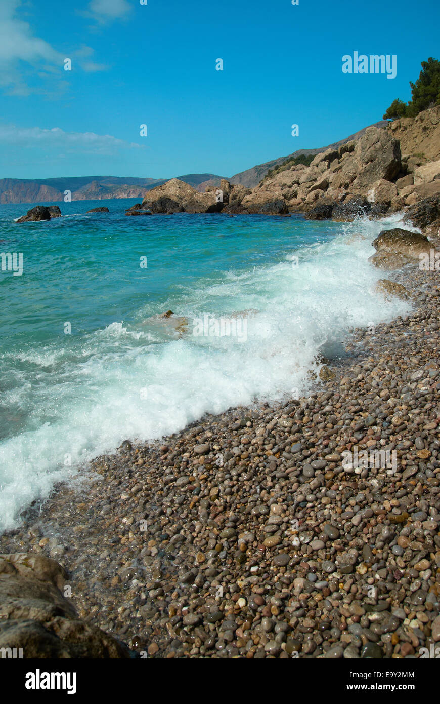 Beautiful sea landscape. Shore, beach and rocks Stock Photo - Alamy