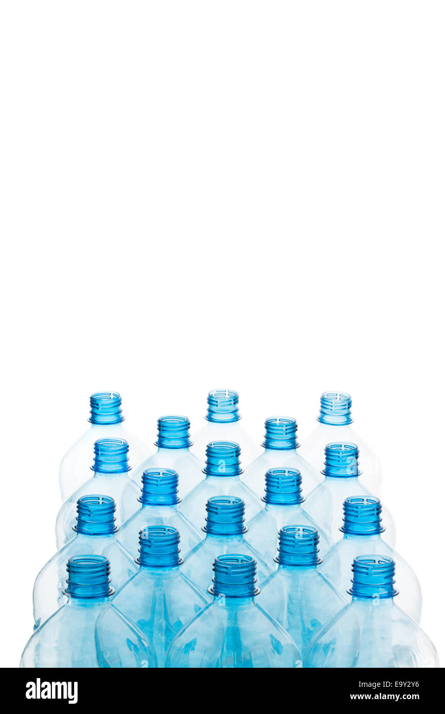 Many empty plastic bottles isolated against a white background. Plastic ...