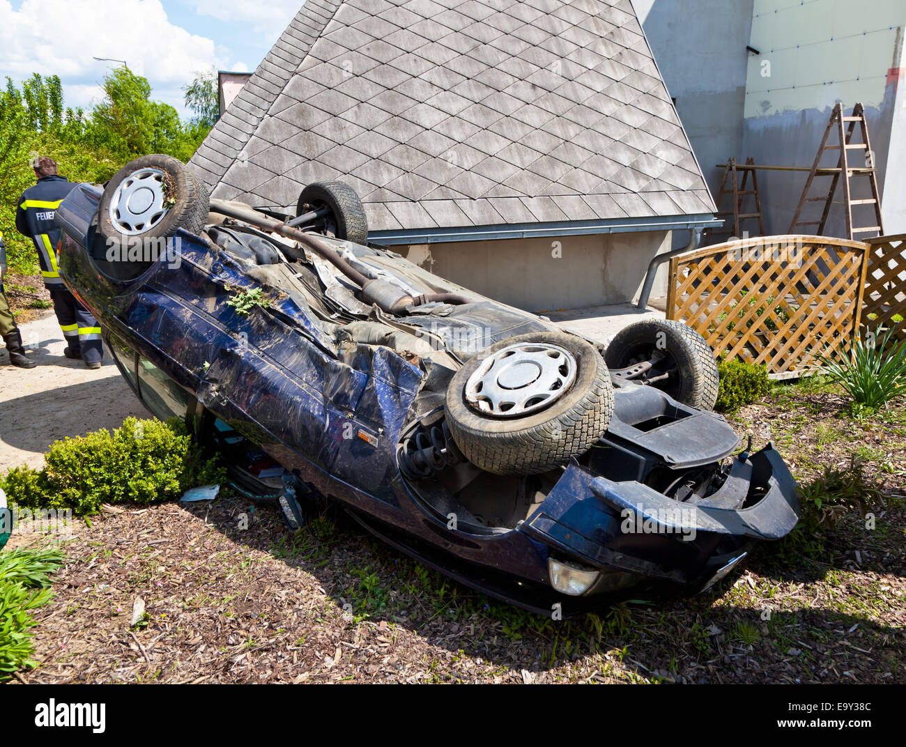 A damaged car after a traffic accident. Vehicle has turned over Stock ...