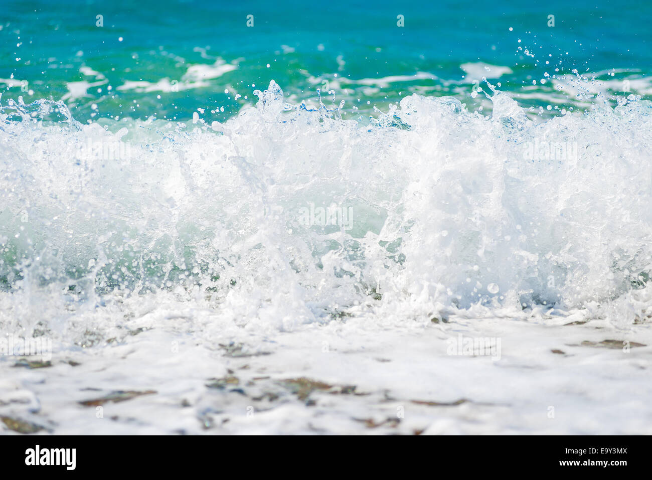 clean sea water is removed close up on the shore Stock Photo - Alamy