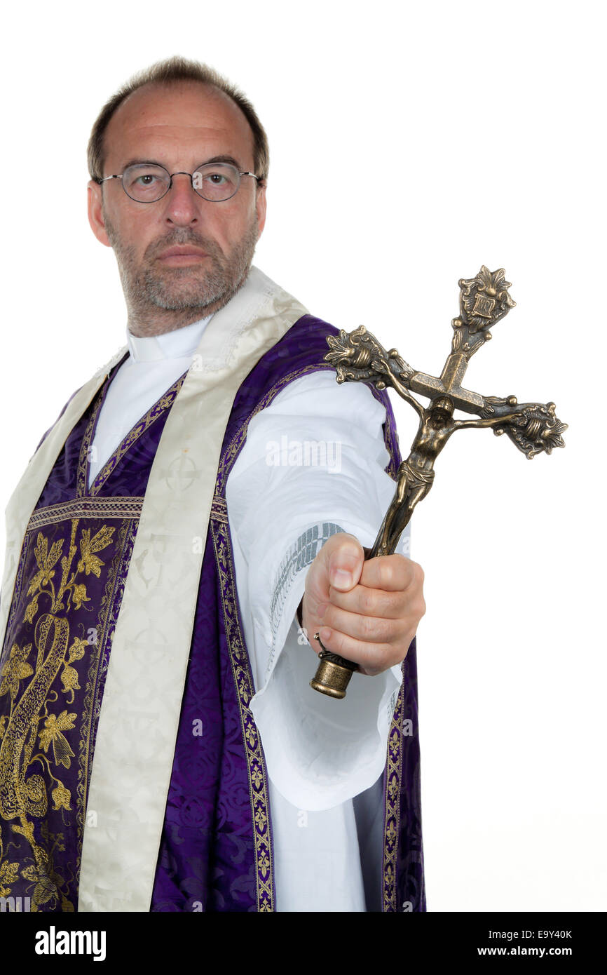 A Catholic priest with a cross in his hand Stock Photo - Alamy