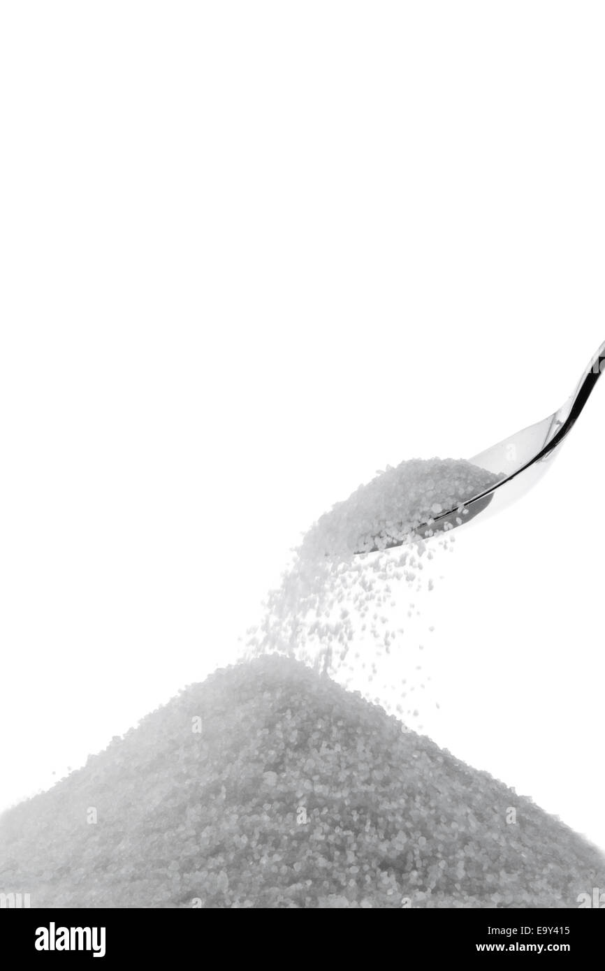 Fine granulated sugar on a spoon Stock Photo - Alamy