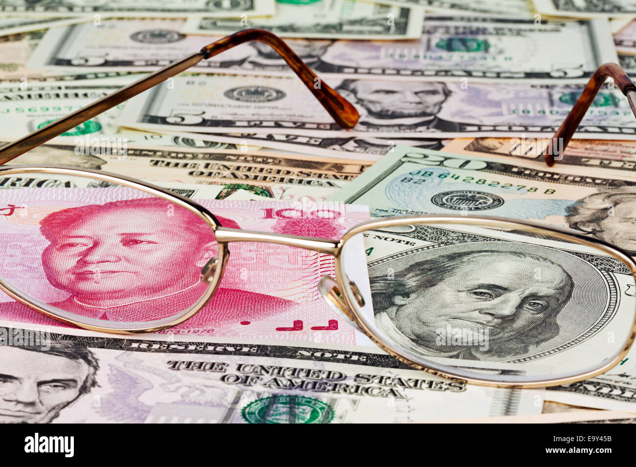 Chinese currency yuan and U.S. dollar banknotes Stock Photo - Alamy