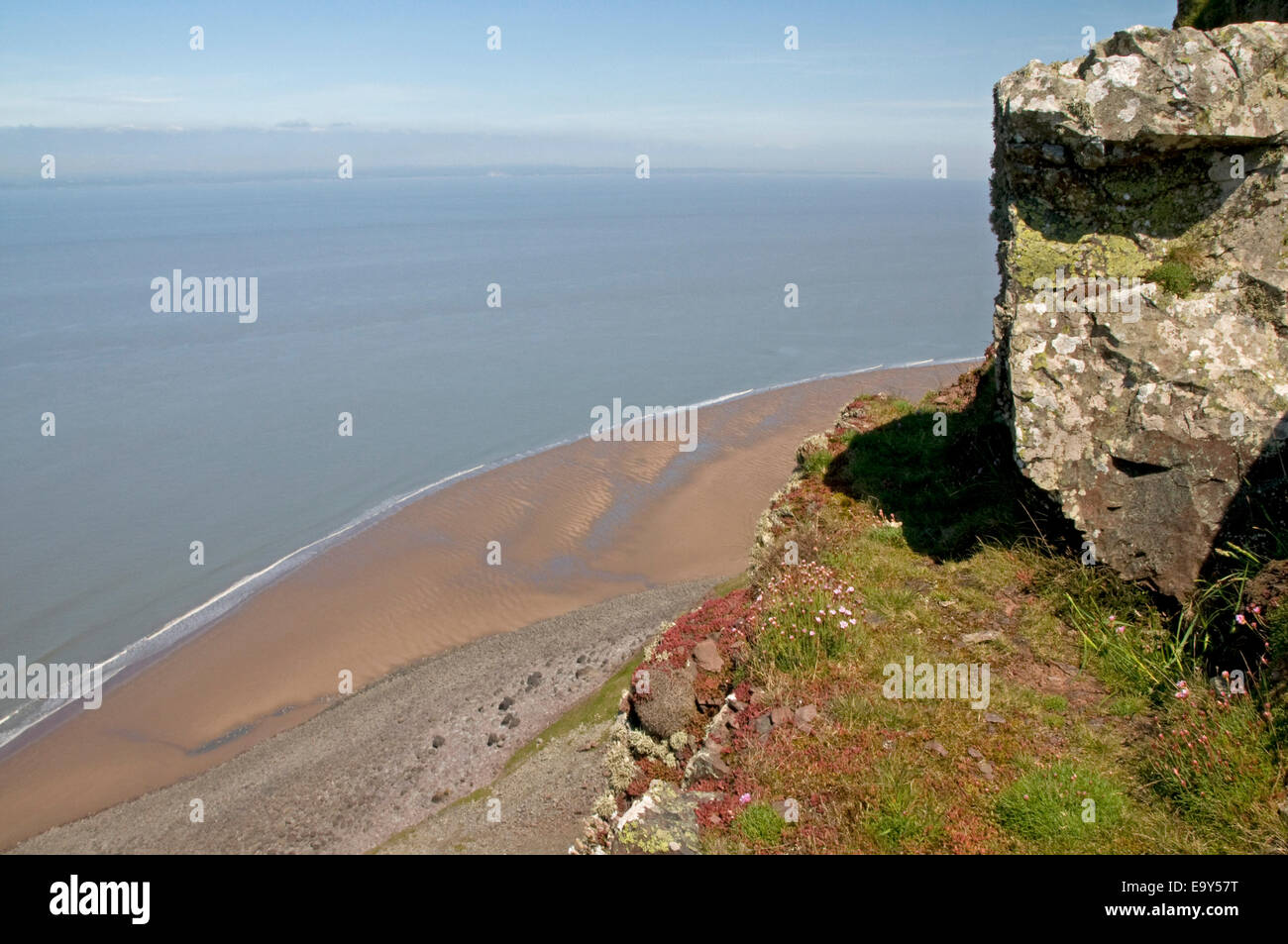 Low tide exposes Selworthy Sand on the Bristol Channel coast of ...
