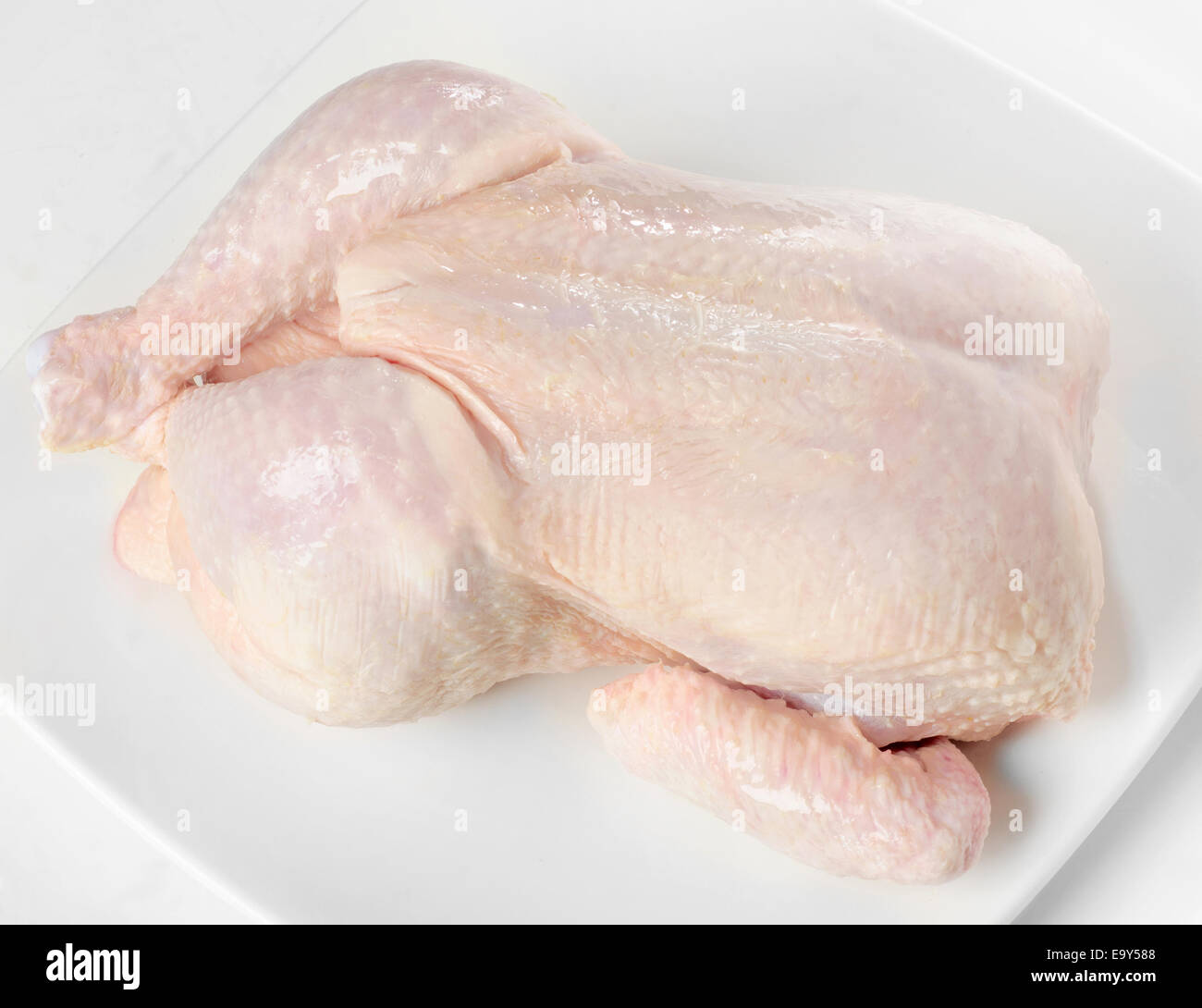 Raw whole chicken plate hi-res stock photography and images - Alamy