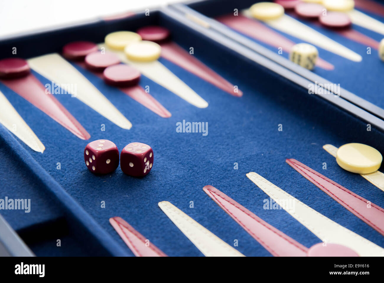 board games - red white and blue backgammon set in play Stock Photo - Alamy