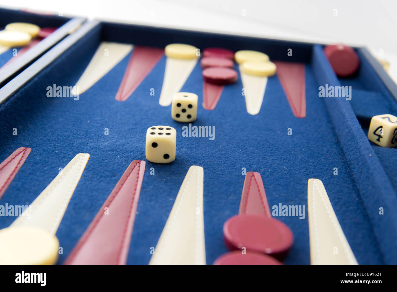 board games - red white and blue backgammon set in play Stock Photo - Alamy