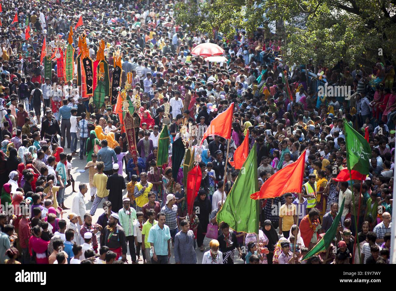 Bangladeshi Shiites join in a religious rally during the celebration of ...