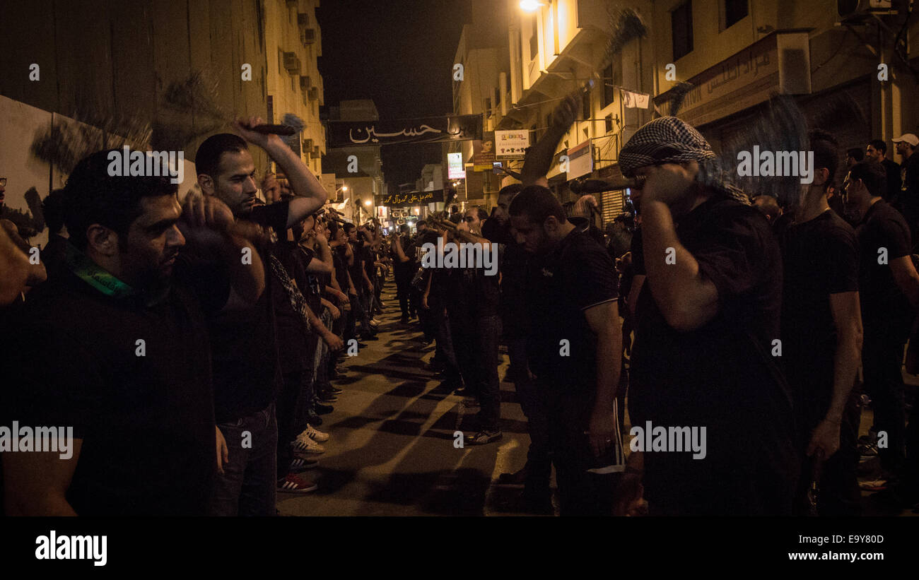 Bahrain. 04th Nov, 2014. Male Shia Muslims take part in ceremonial ...