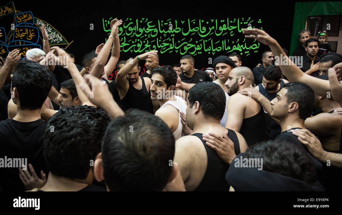 Bahrain. 04th Nov, 2014. Male Shia Muslims take part in ceremonial ...