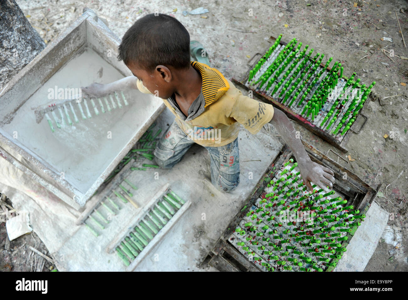 A Child works in a balloon factory's field at Dhaka. In Bangladesh ...
