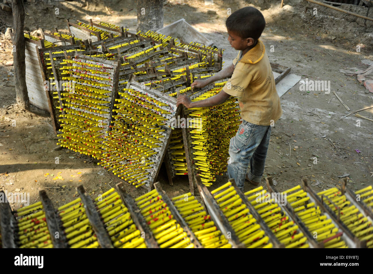 A Child works in a balloon factory's field at Dhaka. In Bangladesh ...