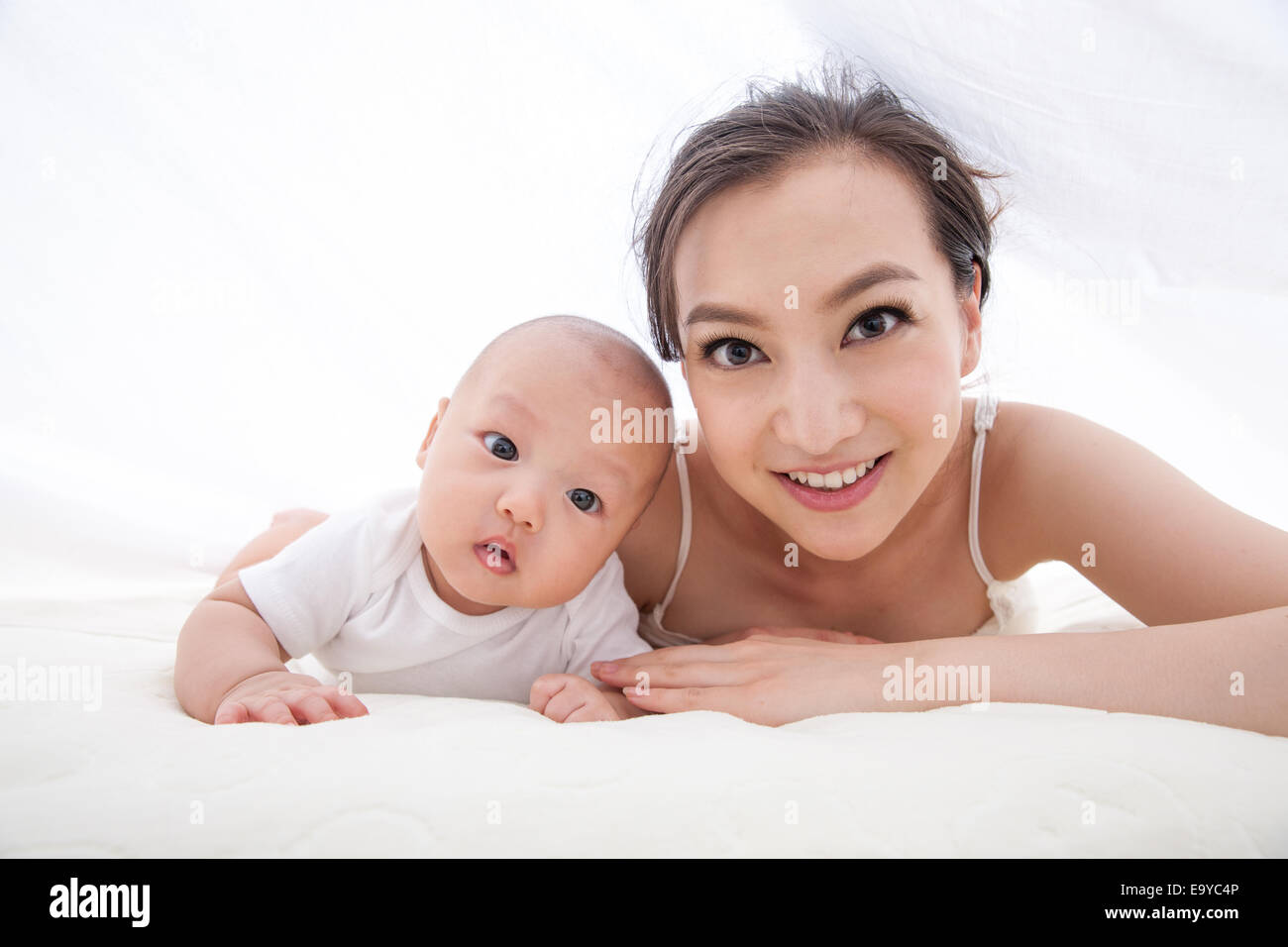 Baby and mother Stock Photo - Alamy