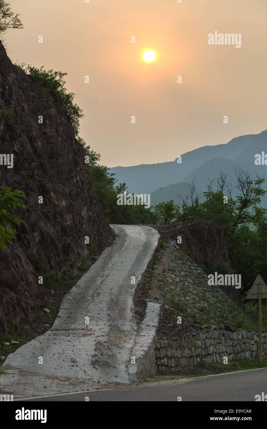 Steep mountain road Stock Photo - Alamy