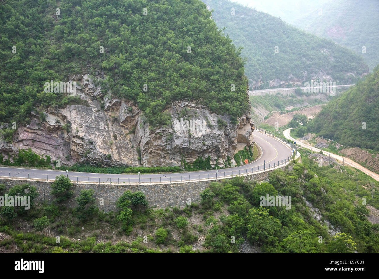 Steep mountain road Stock Photo - Alamy