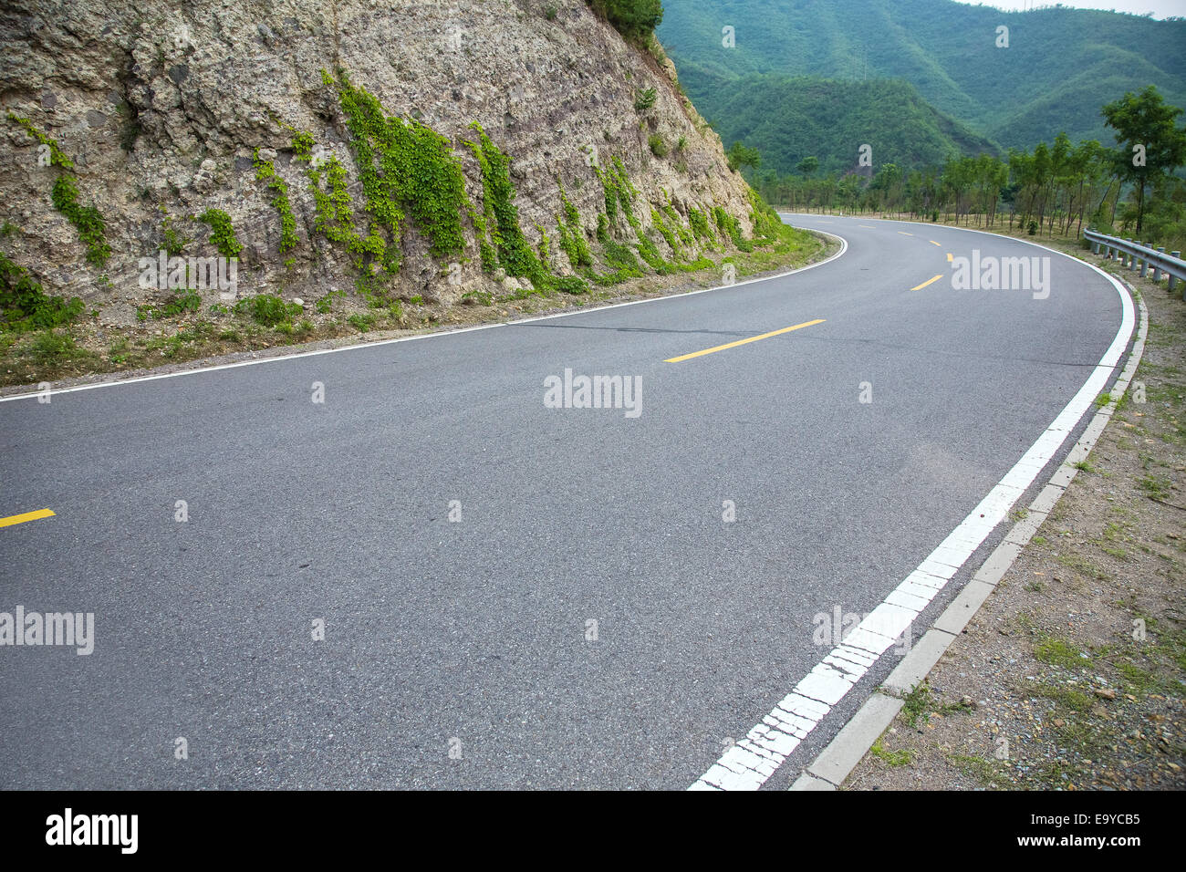 Steep mountain road Stock Photo - Alamy