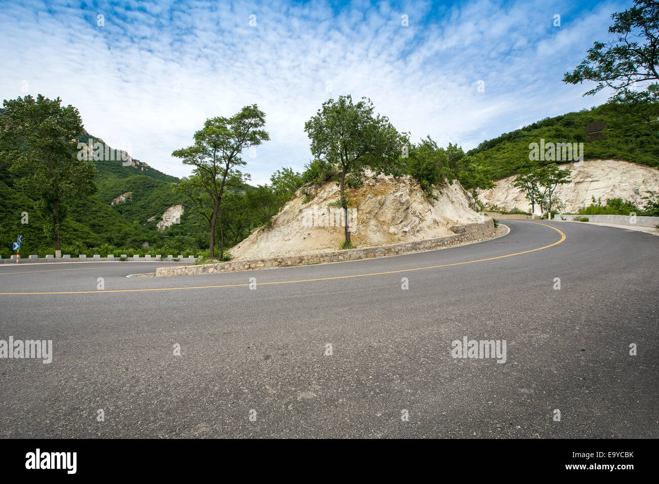 Steep mountain road Stock Photo - Alamy